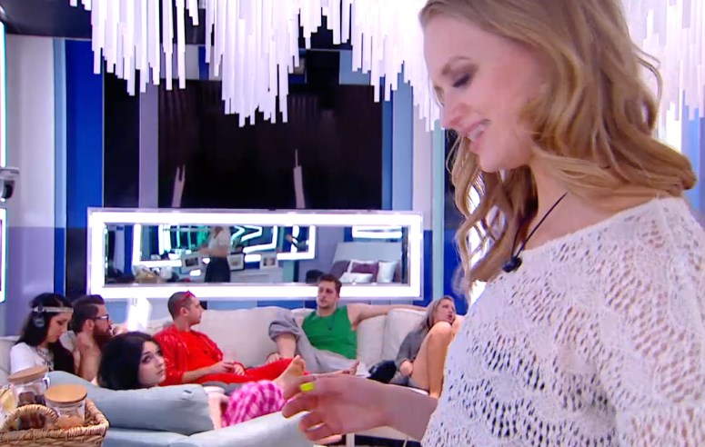 Heather looks at her pics – Big Brother Network Canada